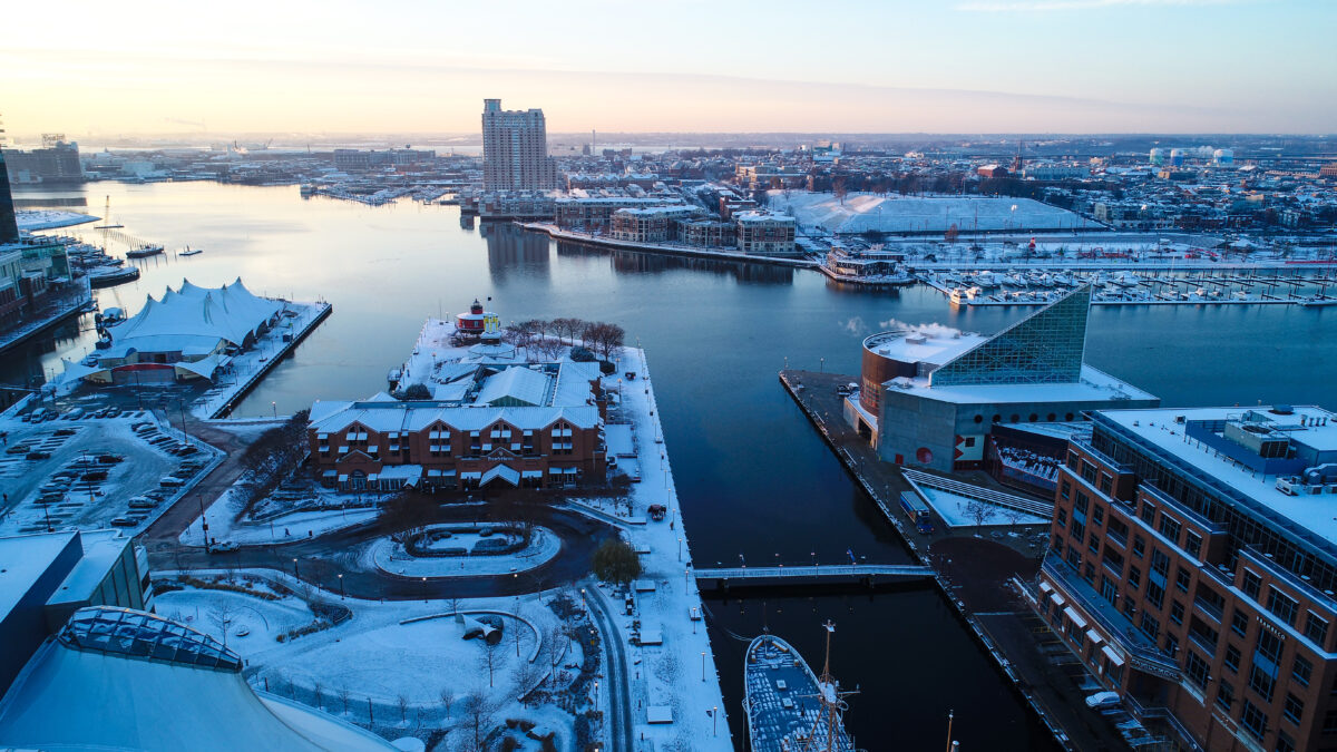 An aerial view of Baltimore, Maryland on a cold, snow covered morning ...